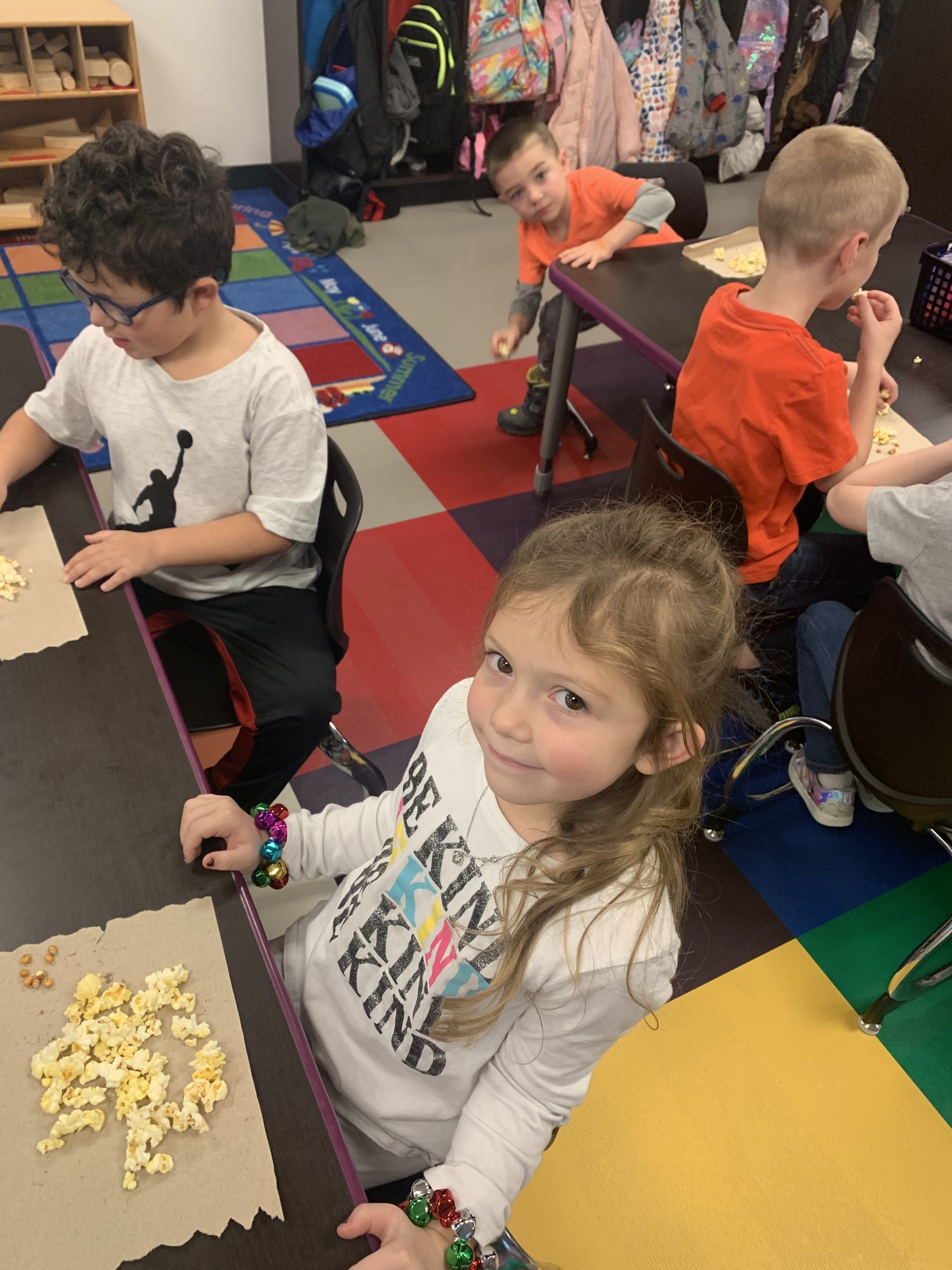 Kindergartners use popcorn to learn senses – Kenton City Schools