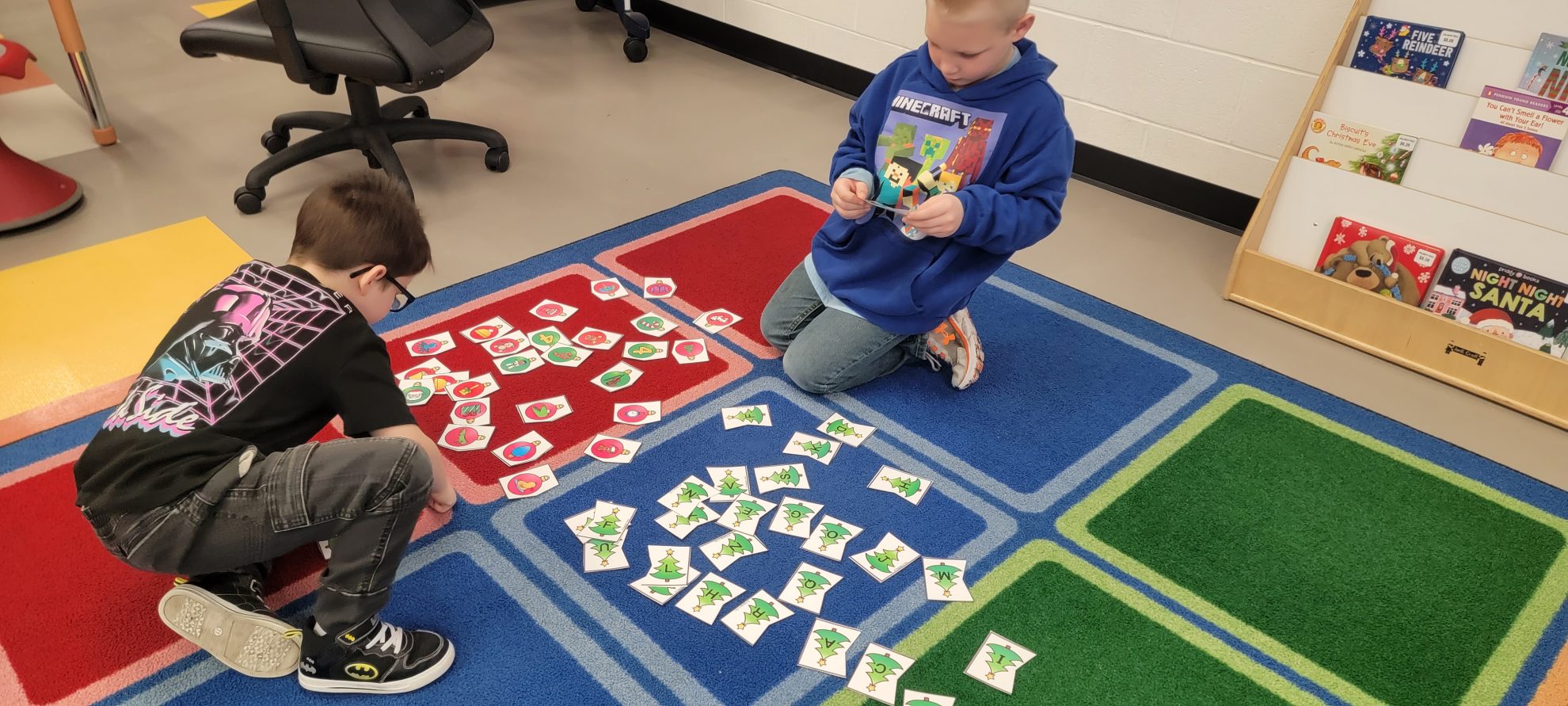 Students learn letter sounds in matching game – Kenton City Schools